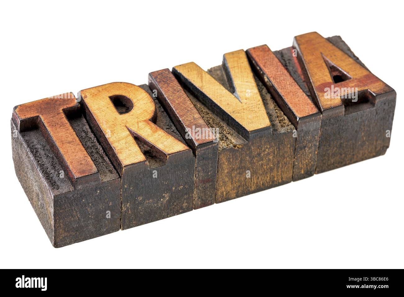Trivia - isolated word in vintage letterpress wood type stained by inks ...