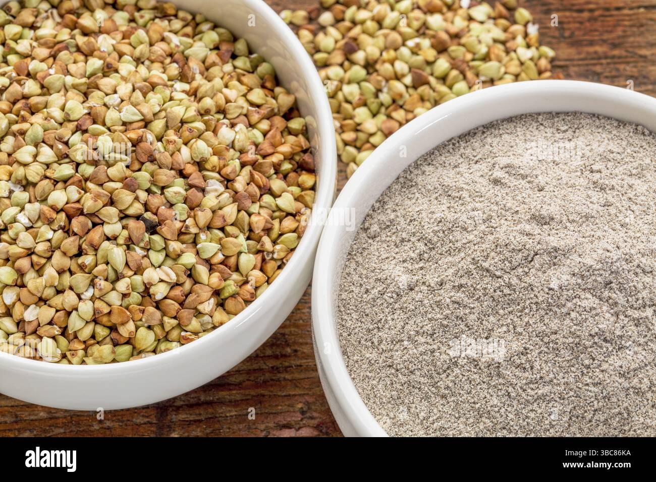 Gluten free buckwheat grain and flour - top view of two ceramic bowls ...