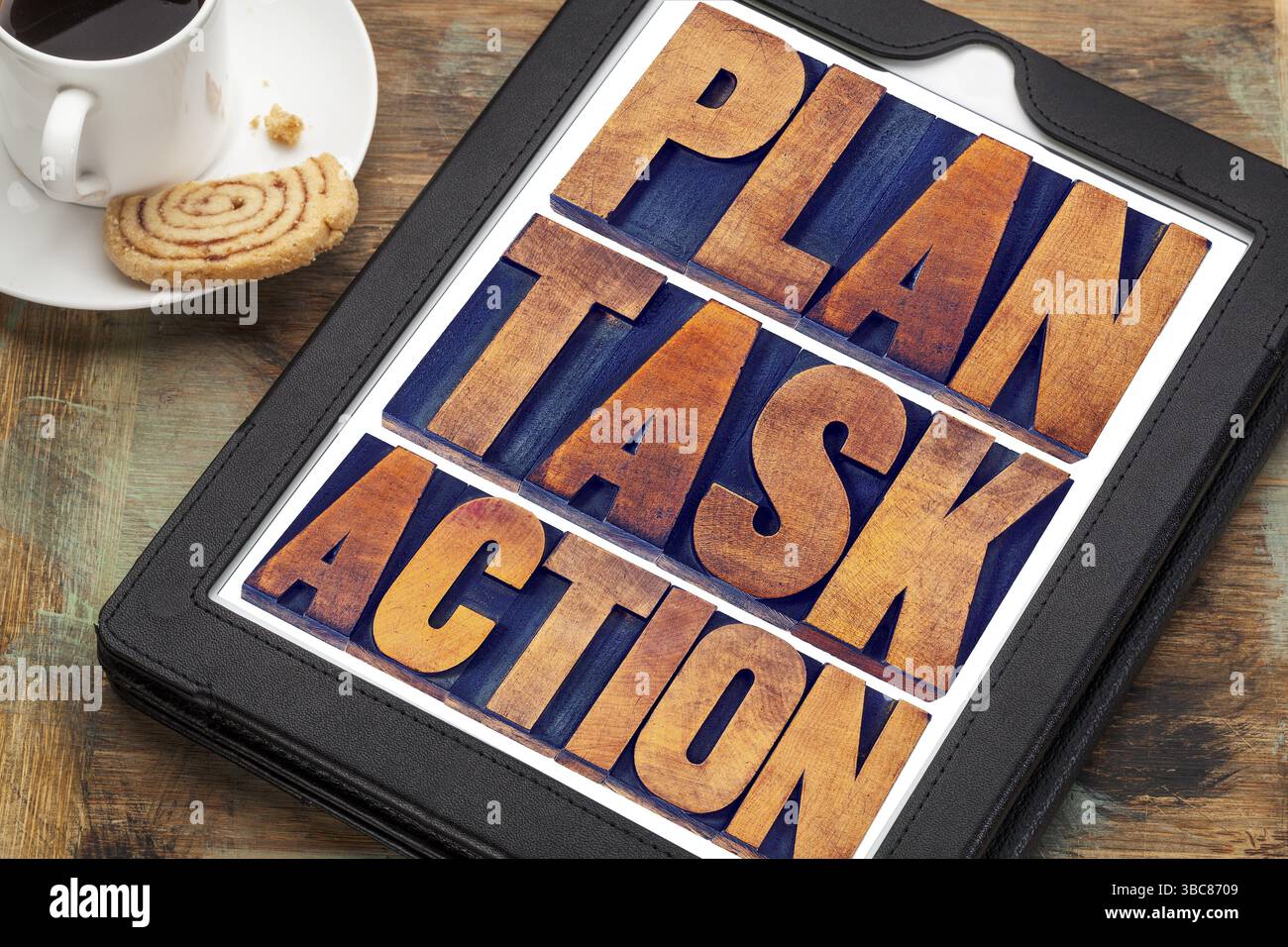 Plan, task, action word abstract - text in vintage letterpress wood ...