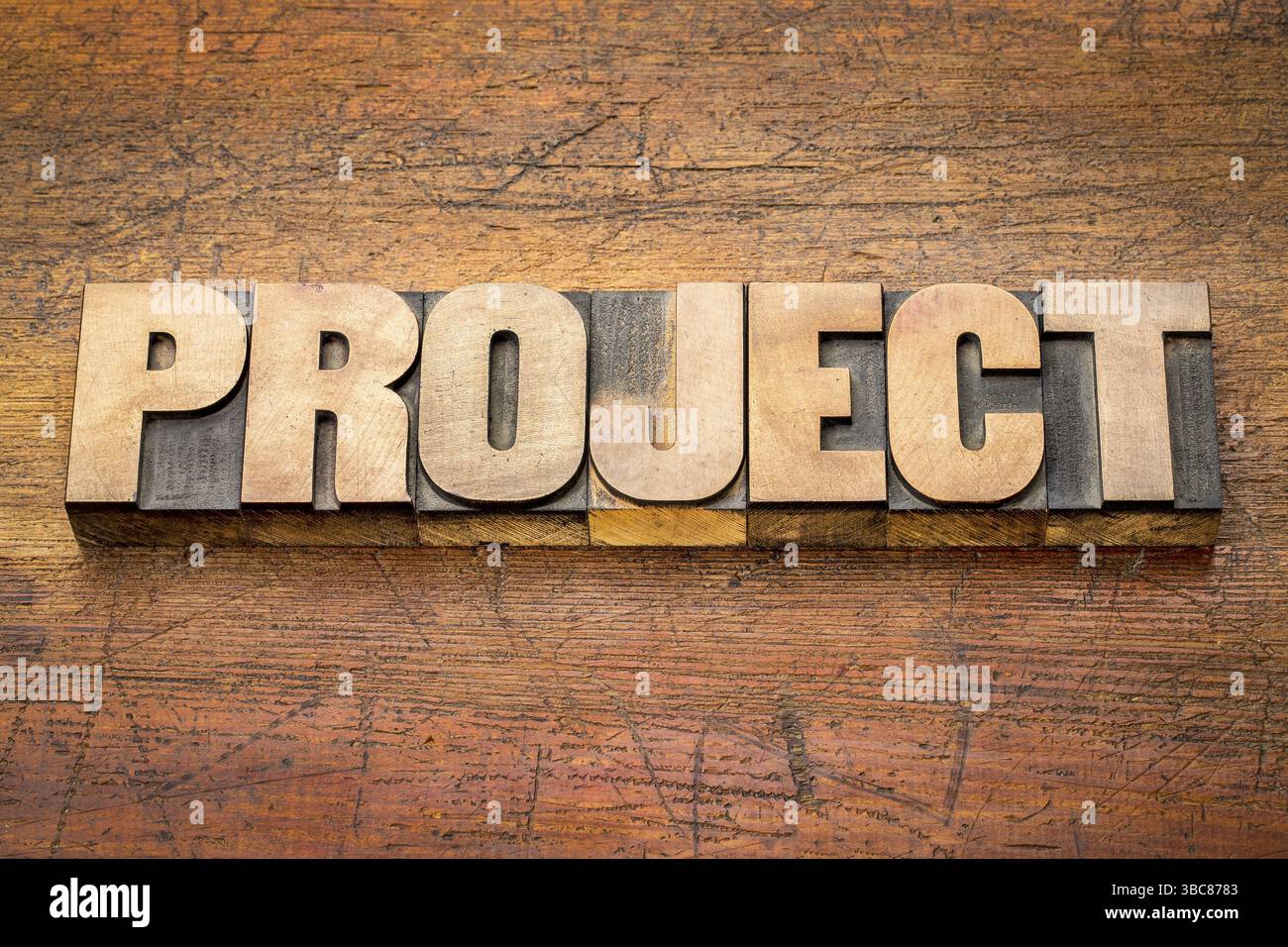 Project word abstract in vintage letterpress printing blocks against ...
