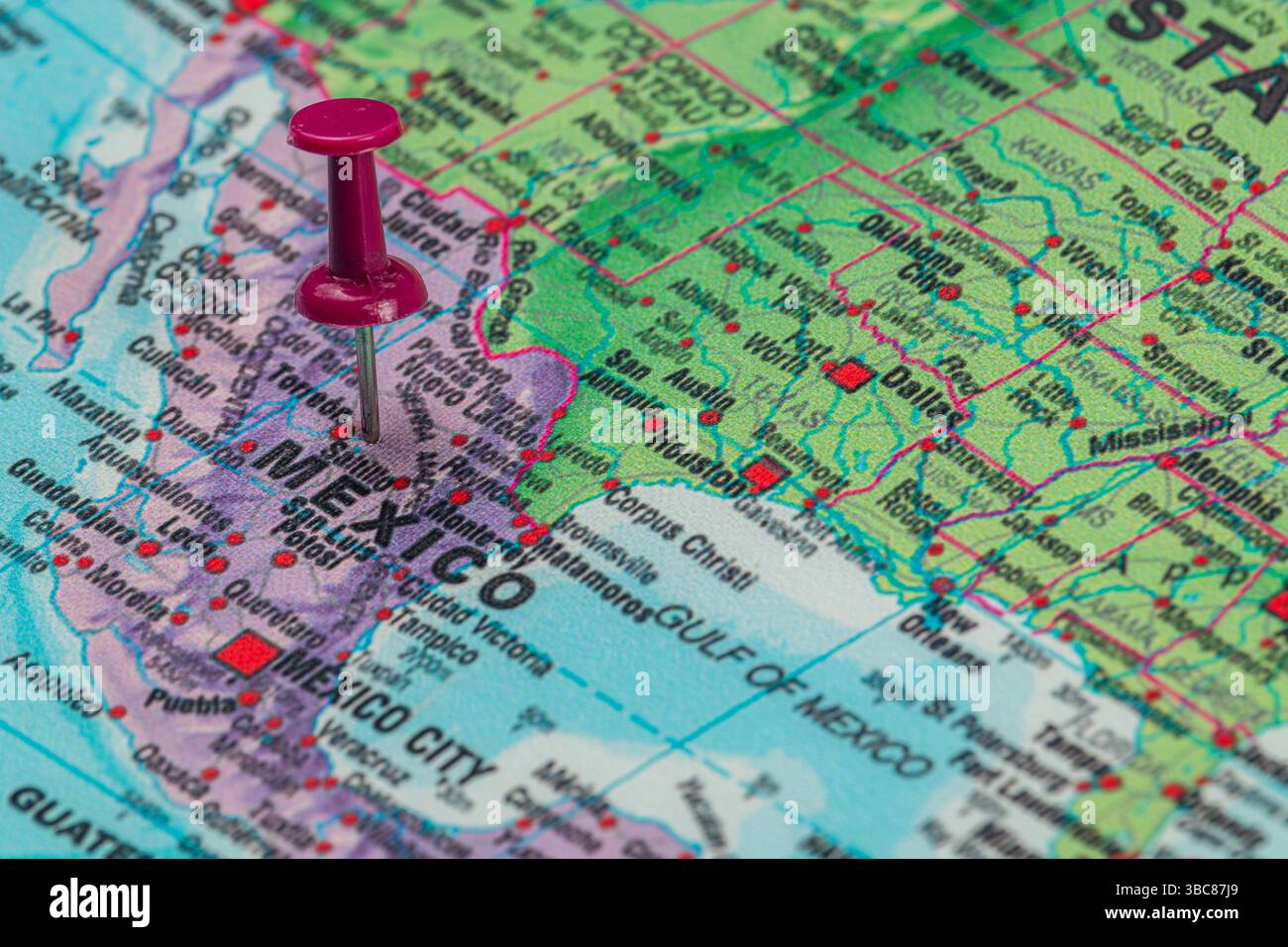 A map of Mexico displays various regions and landmarks with a purple ...