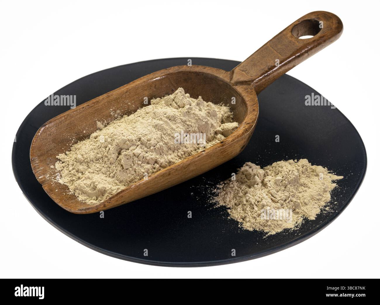 Ashwagandha root (aka Indian ginseng) powder on rustic wooden scoop ...