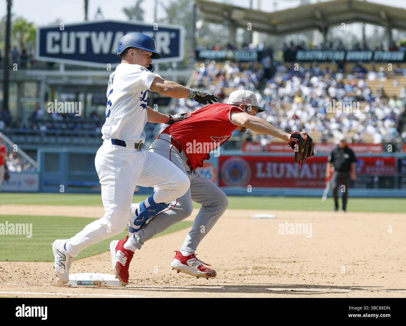 Los Angeles Angels pitcher Yusei Kikuchi (R) collides Tommy Edman of ...