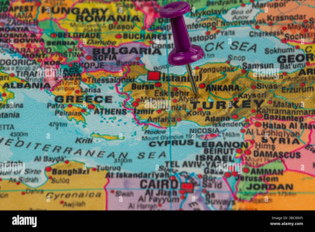A purple pushpin marks the location of Turkey on a detailed map showing ...