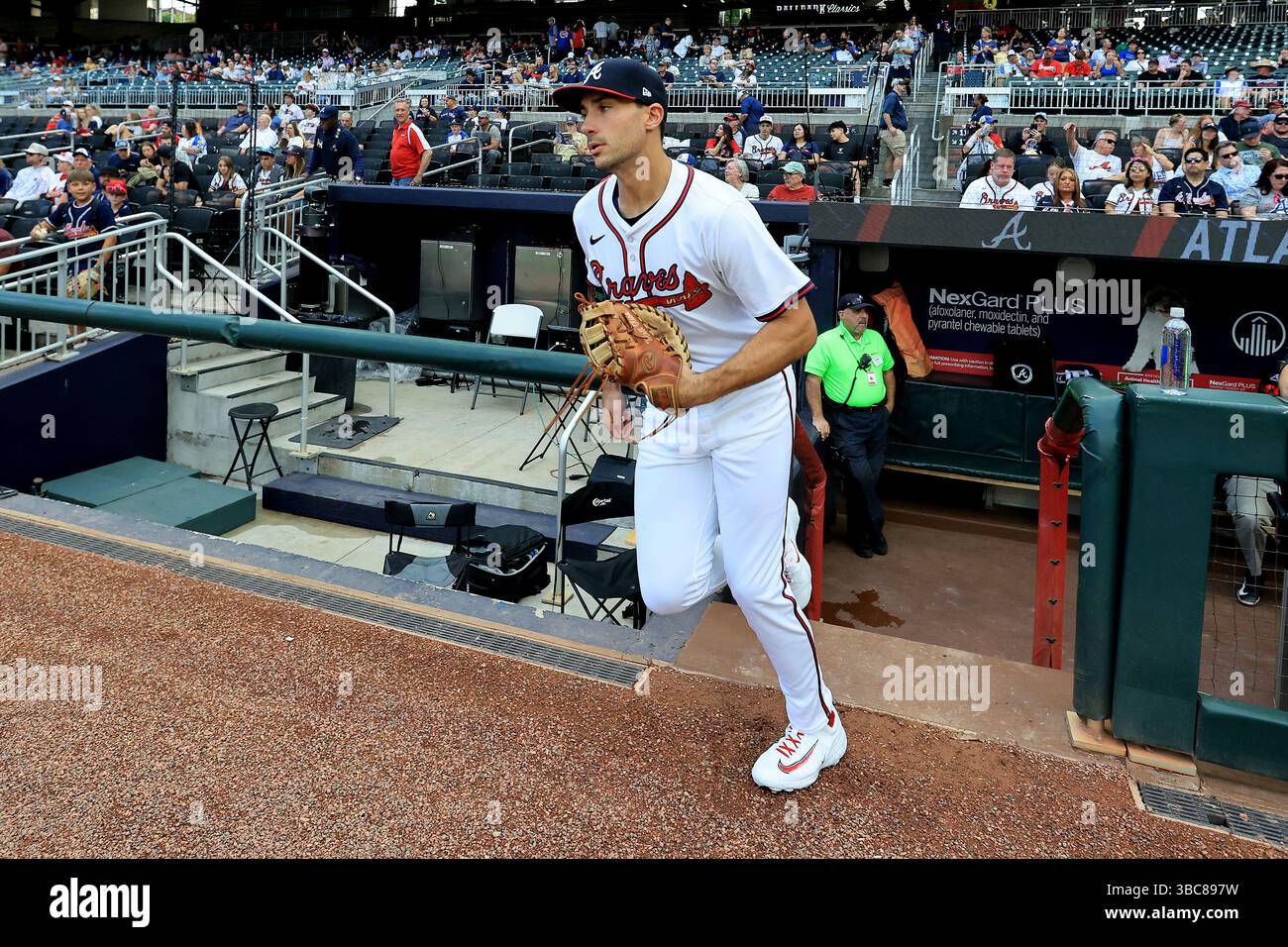 ATLANTA, GA - MAY 12: Matt Olson (28) of the Atlanta Braves jogs onto ...