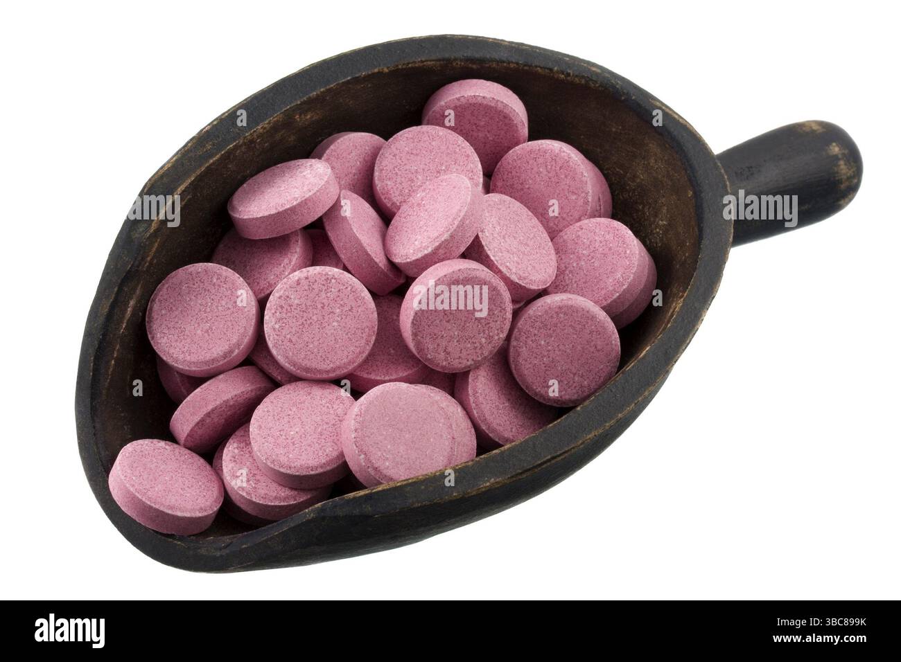 Pink pills (tablets) of vitamin, dietary supplement or stomach medicine ...