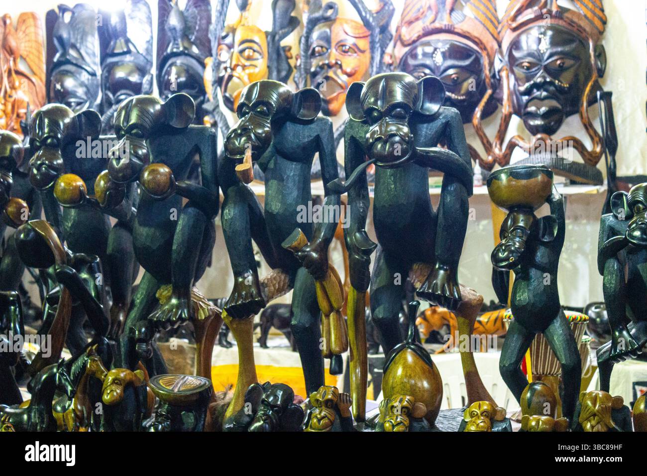 Dense Display of African Wood Carvings Stock Photo - Alamy