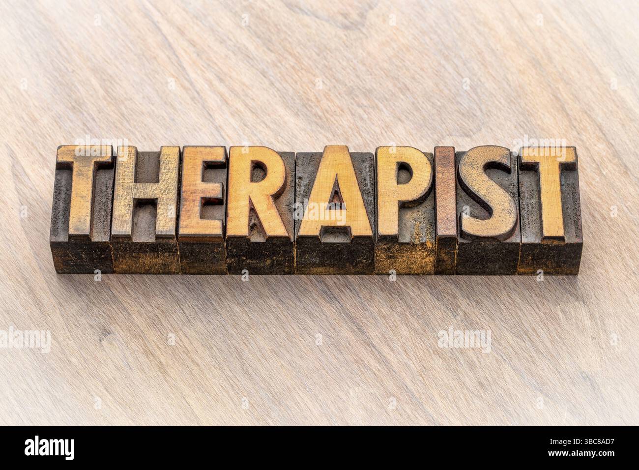 Therapist word in vintage letterpress wood type blocks Stock Photo - Alamy