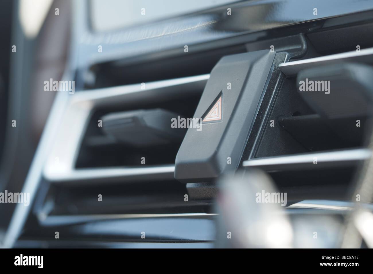 Car dashboard with air vent and hazard button detail Stock Photo - Alamy