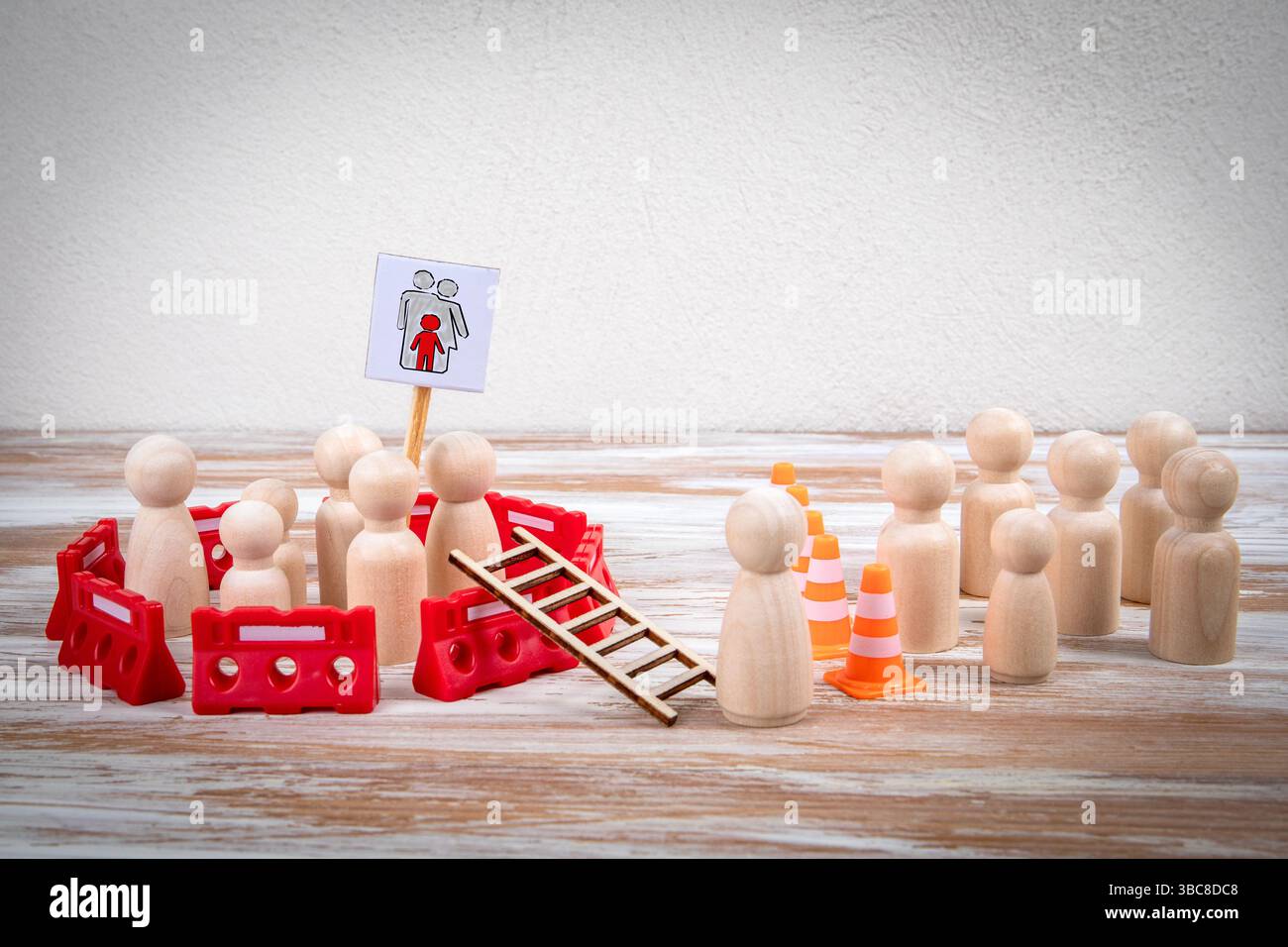 Wooden Figures with Safety Barriers and Ladder Representing Family ...