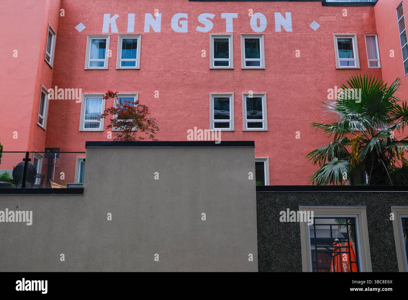 The pink wall of the boutique Kingston Hotel along Richards Street in ...