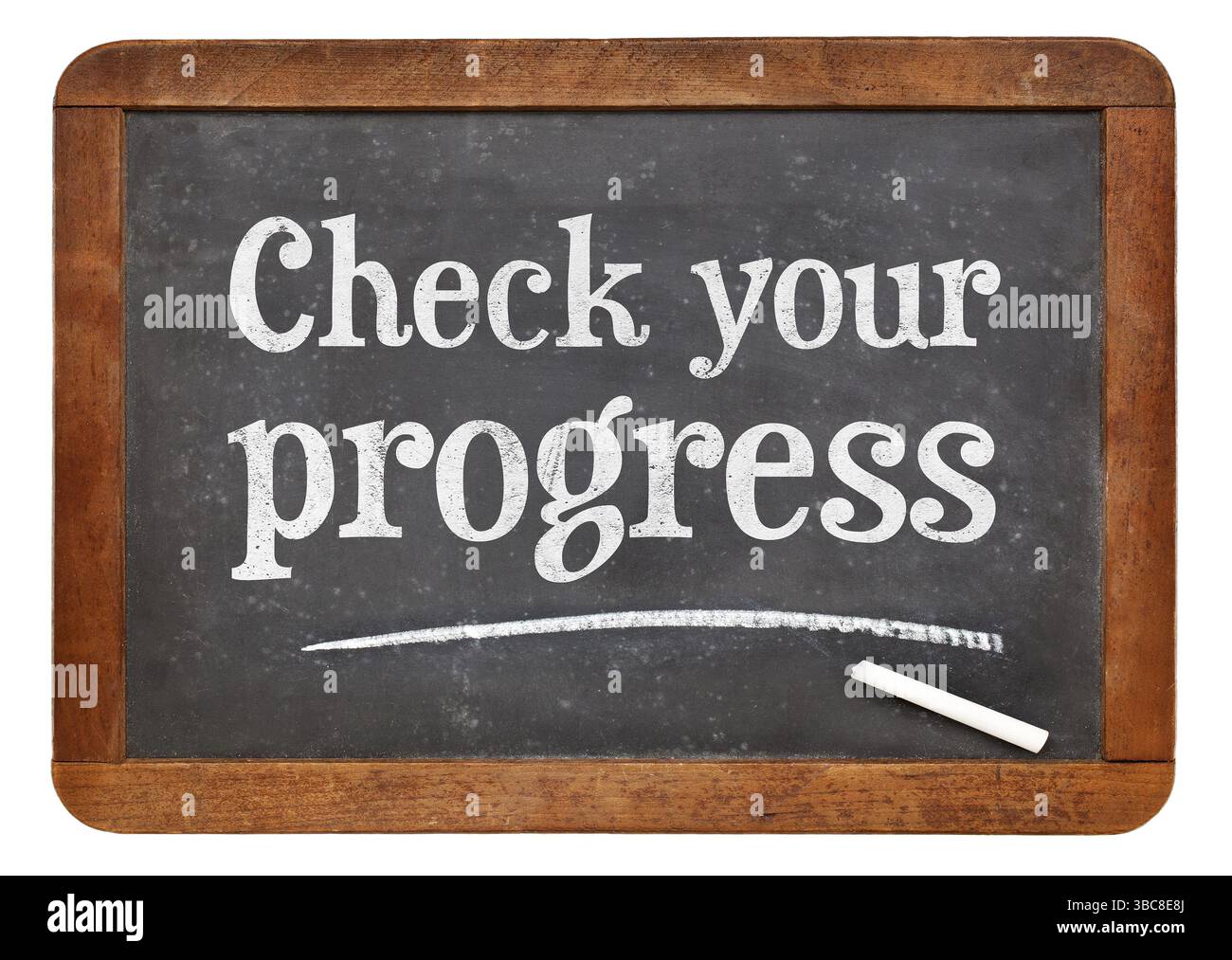 Check your progress - white chalk text on a vintage slate blackboard ...