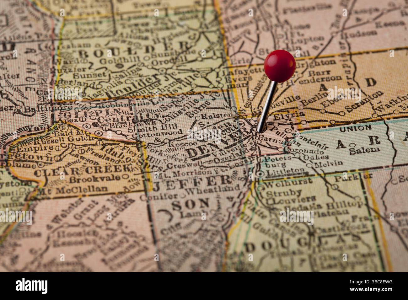 Denver on vintage 1920s map of Colorado with a red pushpin, selective ...