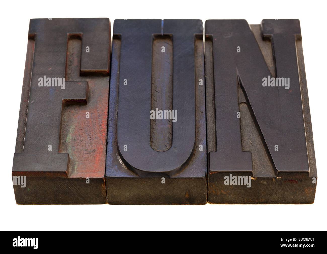 Fun word in antique wooden letterpress printing blocks, stained by ...