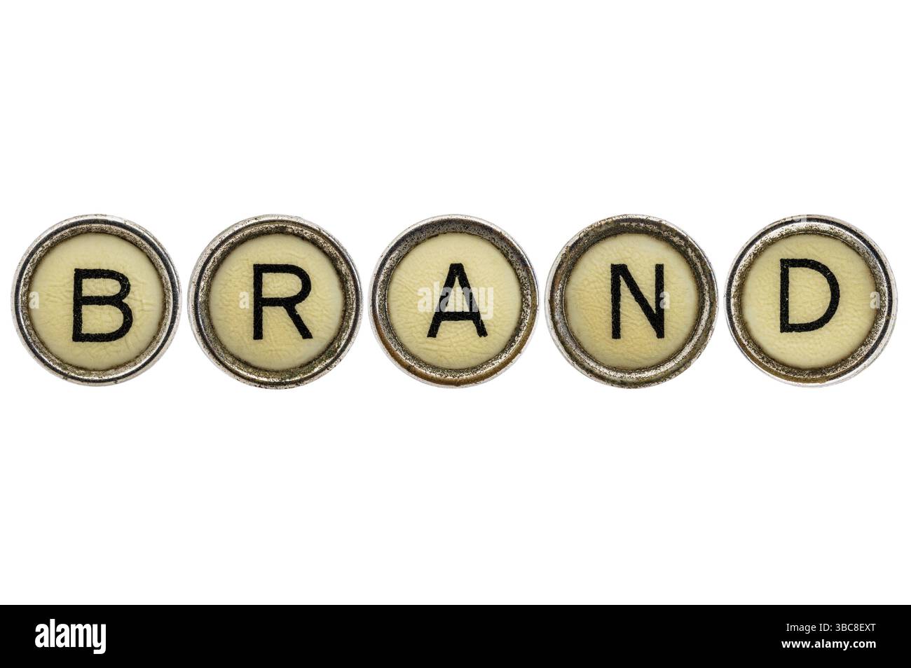 Brand word in old round typewriter keys isolated on white Stock Photo ...
