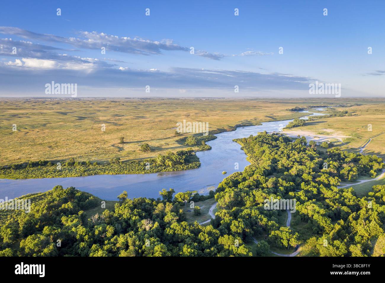 Shallow and wide Dismal RIver meandering trough Nebraska Sandhills at ...