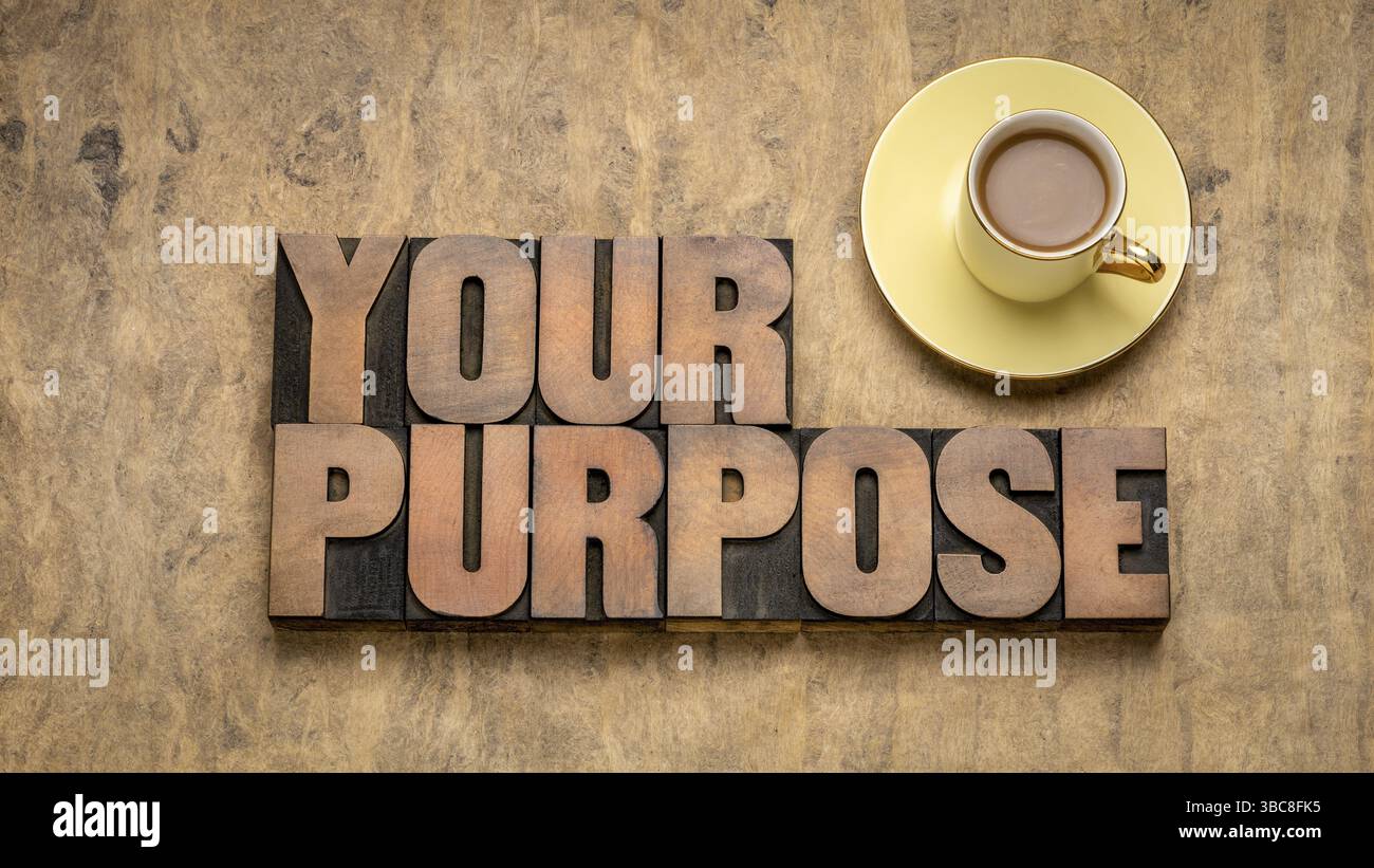 Your purpose - text in vintage letterpress wood type with a cup of ...