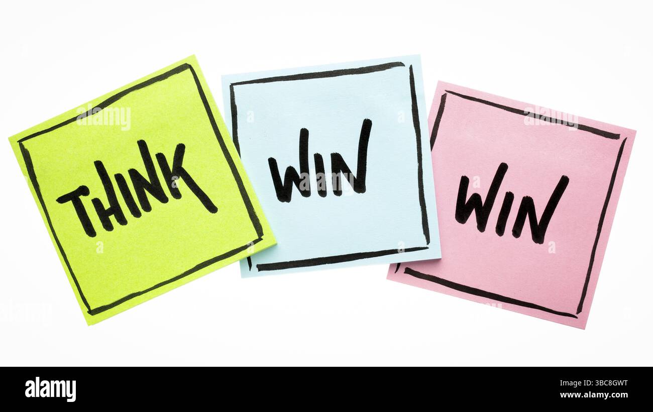 Think win-win concept - handwriting on sticky notes isolated on white ...
