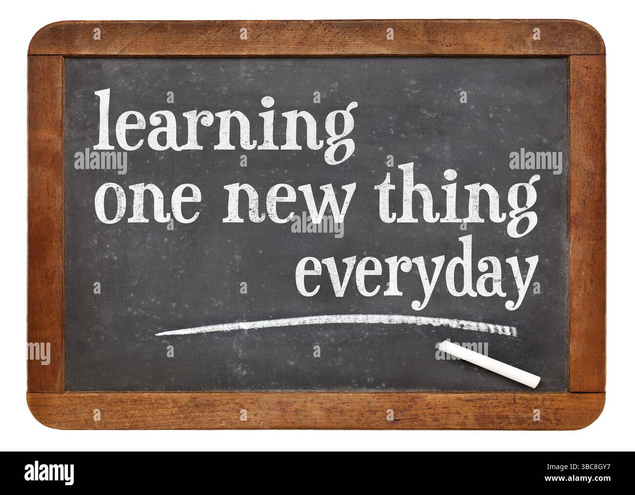 Learning one new thing everyday - motivational text on a vintage slate ...