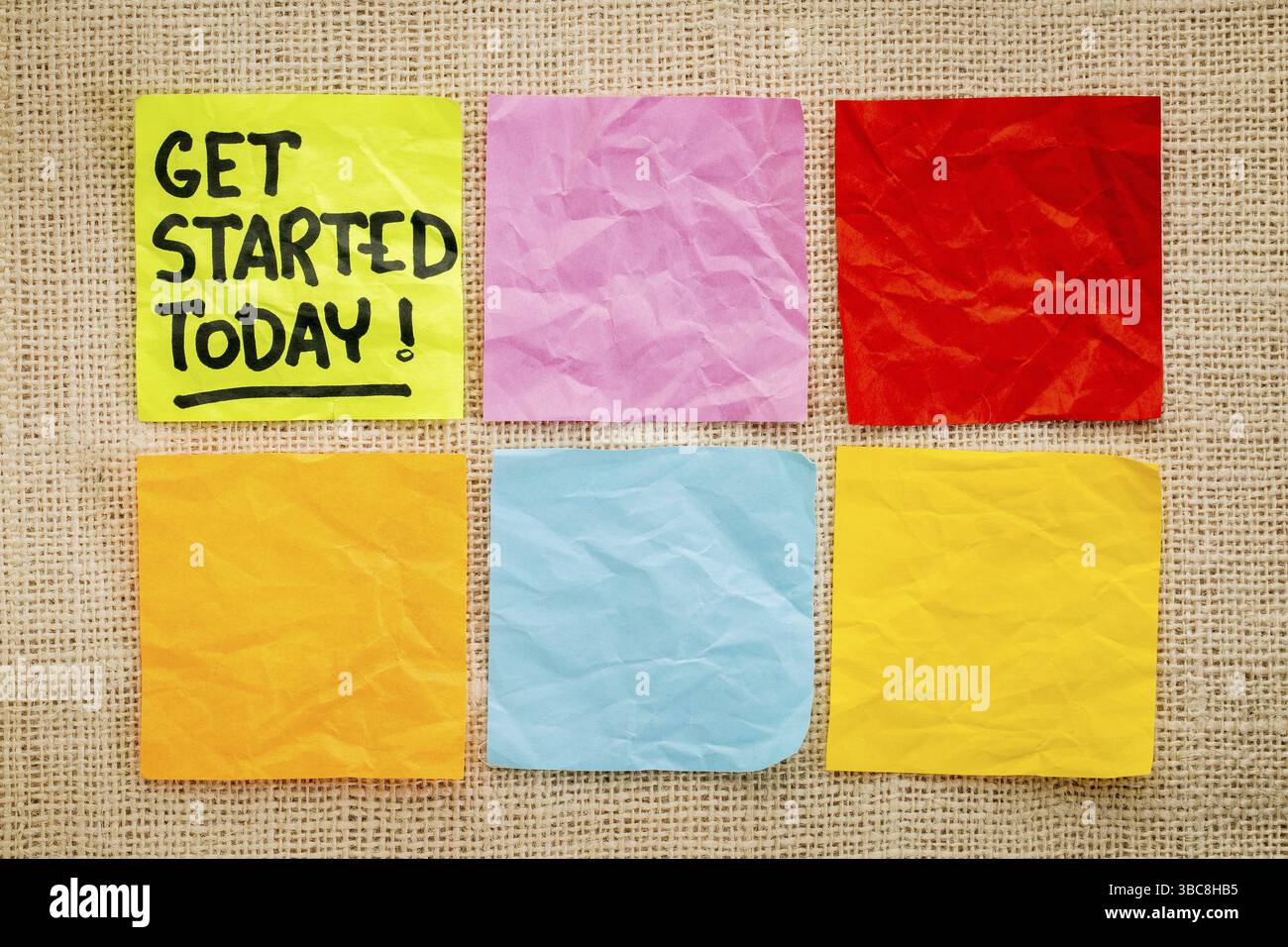 Get started today reminder - handwriting on a sticky note against ...