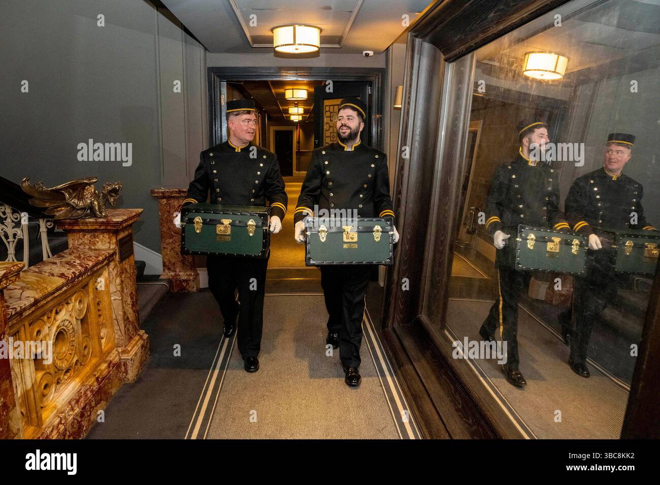 EDITORIAL USE ONLY Porters dressed in uniforms from the 1900s at the ...