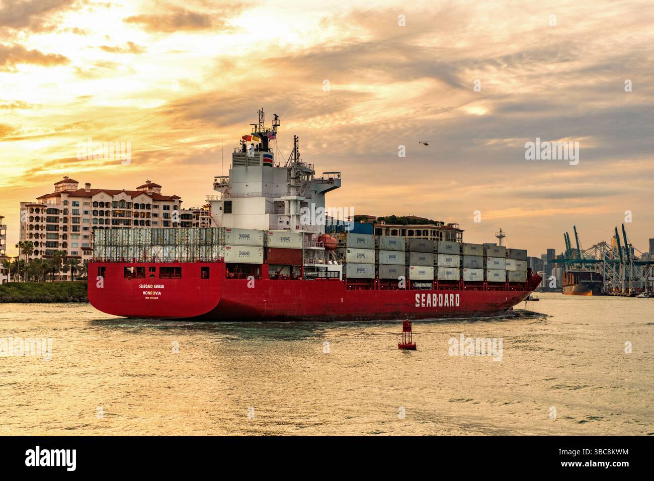 Miami, Florida, USA - January 03, 2025: Aerial cargo ship entering port ...