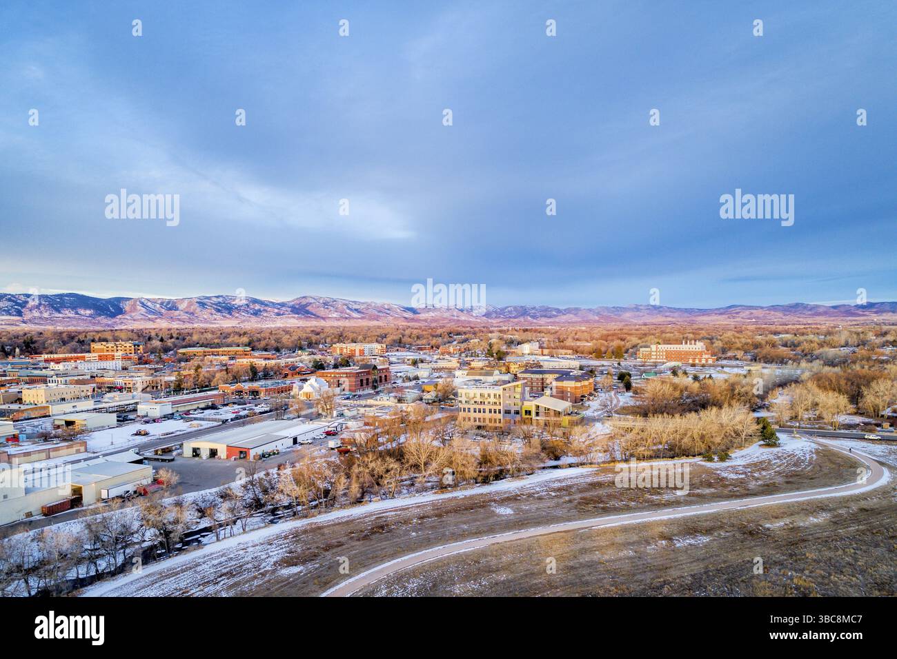 Aerial view of Fort Collins downtown, Poudre River and a bike trail ...