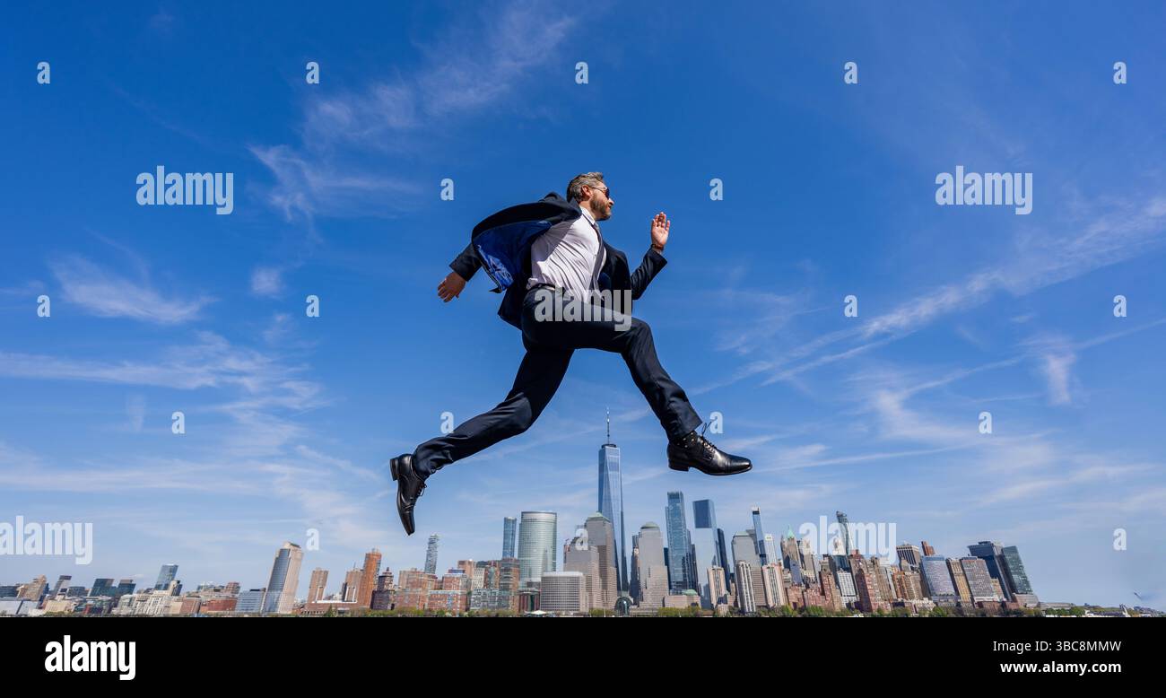 Business success. Successful businessman hurrying on New York city ...