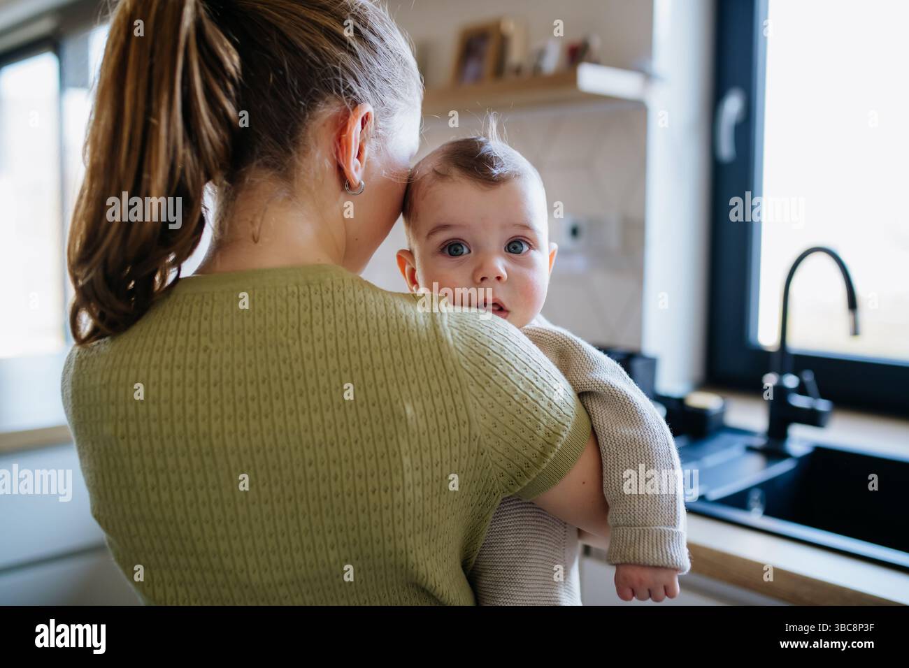 Big sister comforting her little sister hi-res stock photography and ...