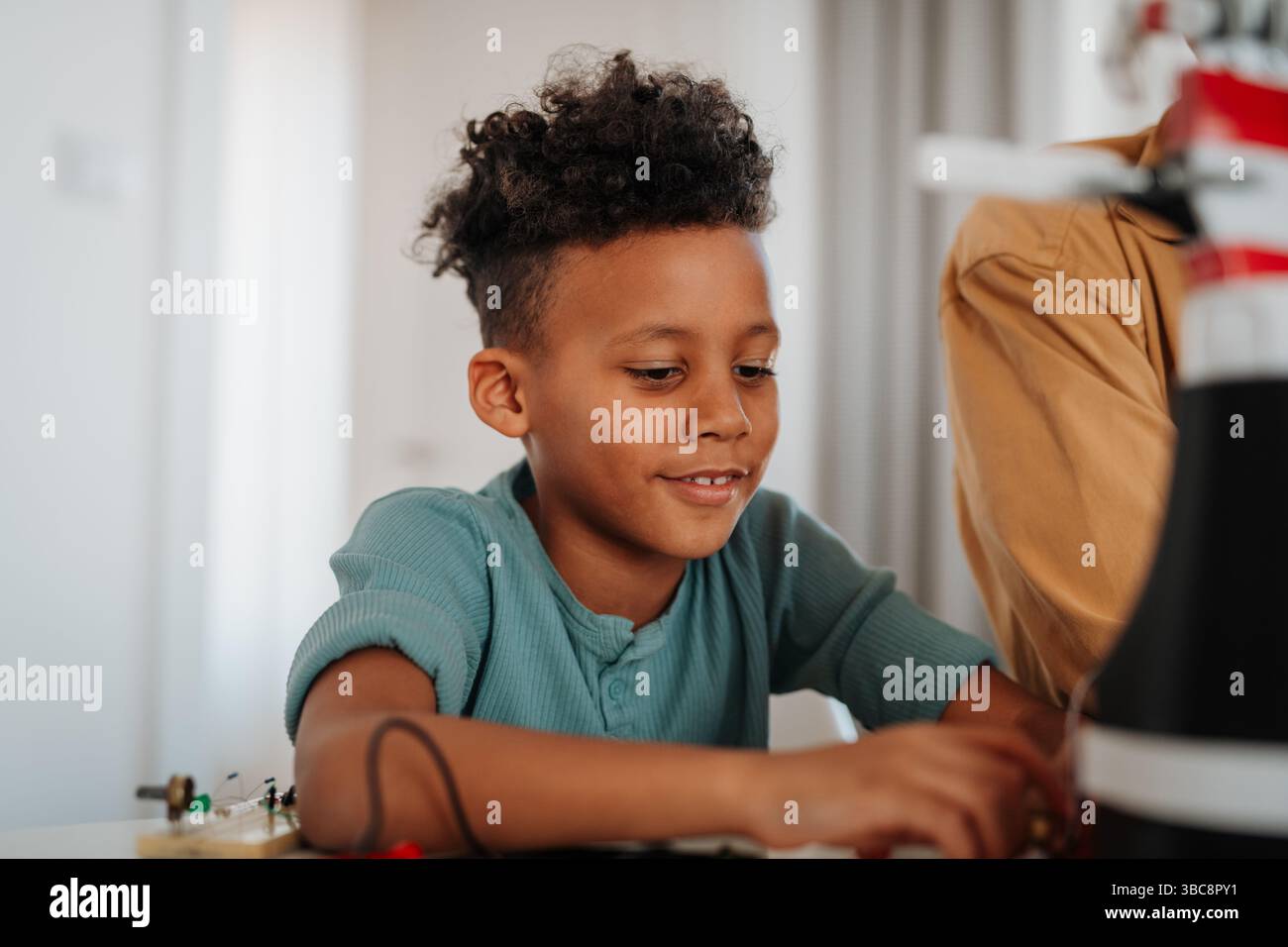 Father and son exploring STEM, robotics, and technology together Stock Photo - Alamy