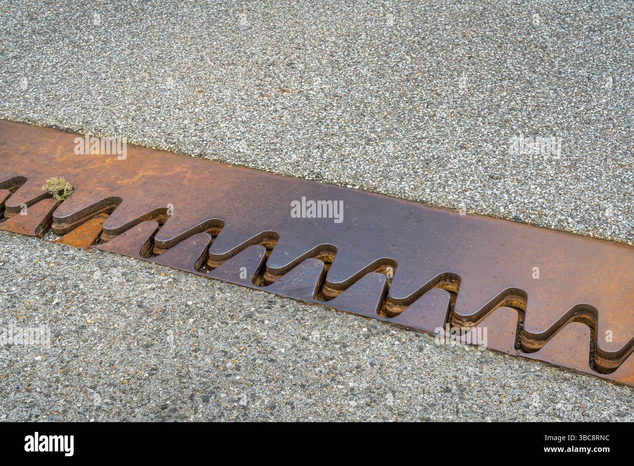 Steel extension or movement joint on a bridge Stock Photo - Alamy