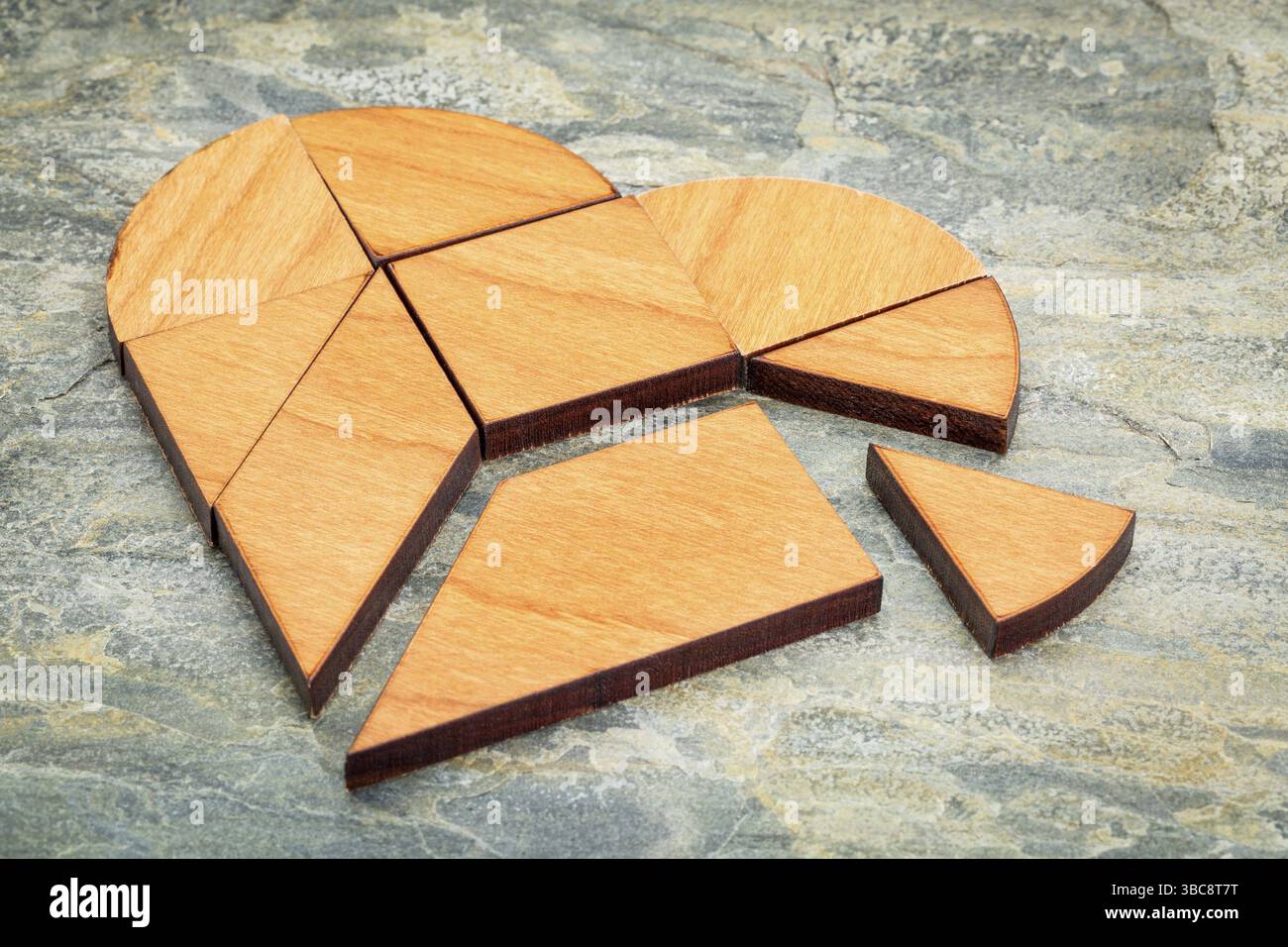 Heart version of tangram, a traditional Chinese Puzzle Game made of ...