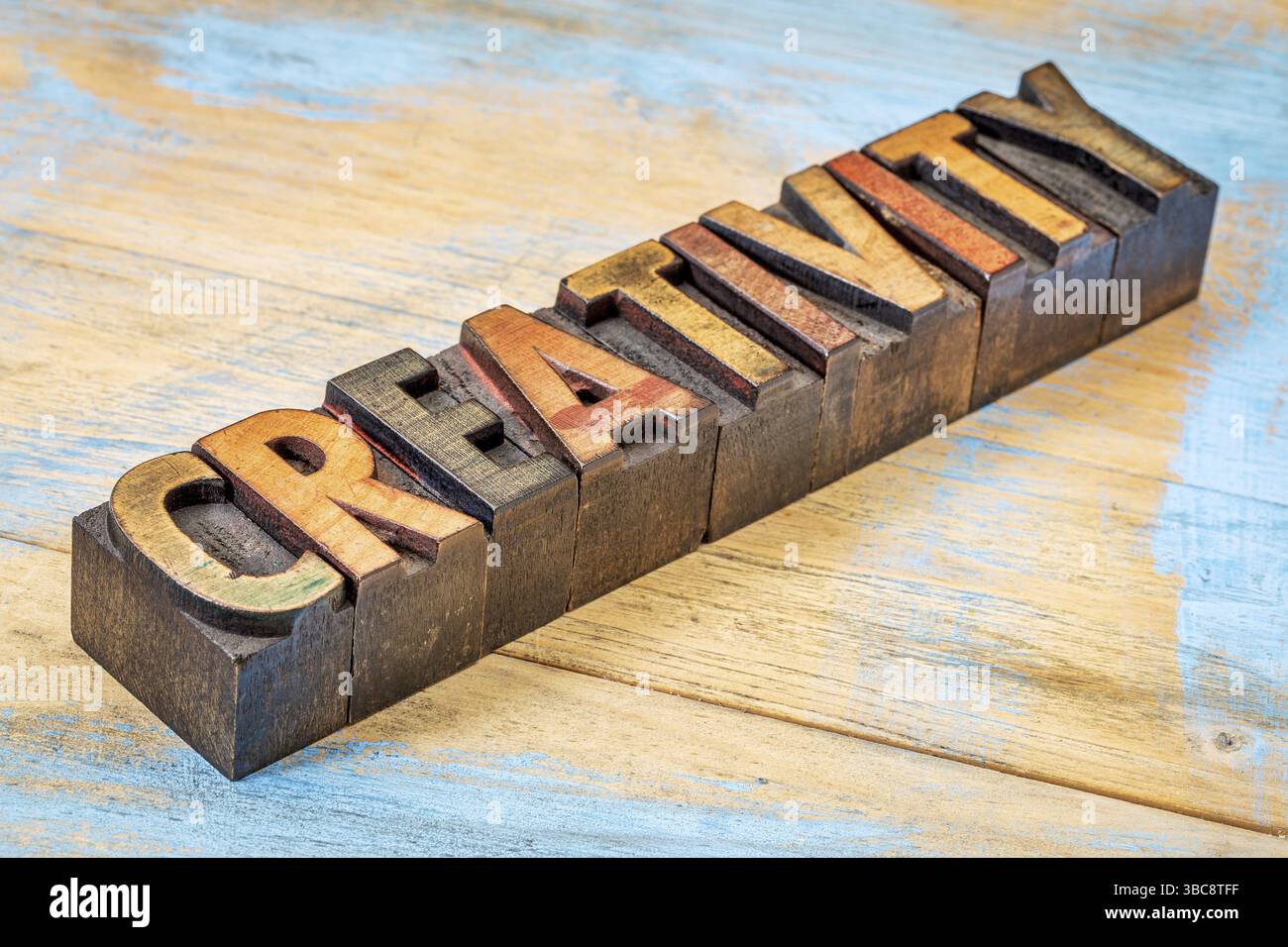 Creativity word - diagonal text in vintage letterpress wood type ...