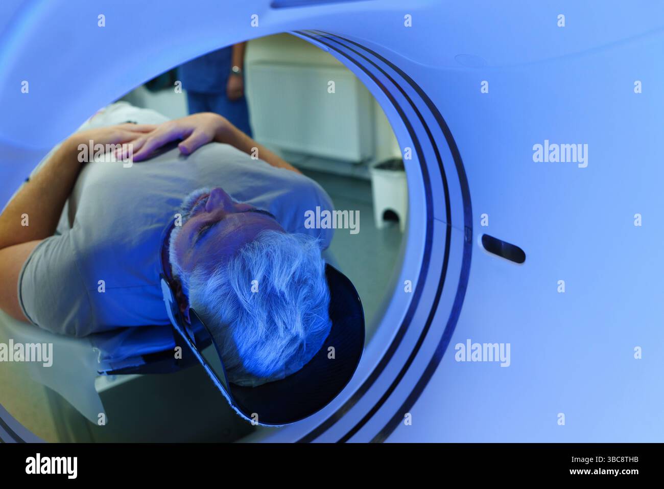 Male patient undergoing CT scan examination in hospital Stock Photo - Alamy