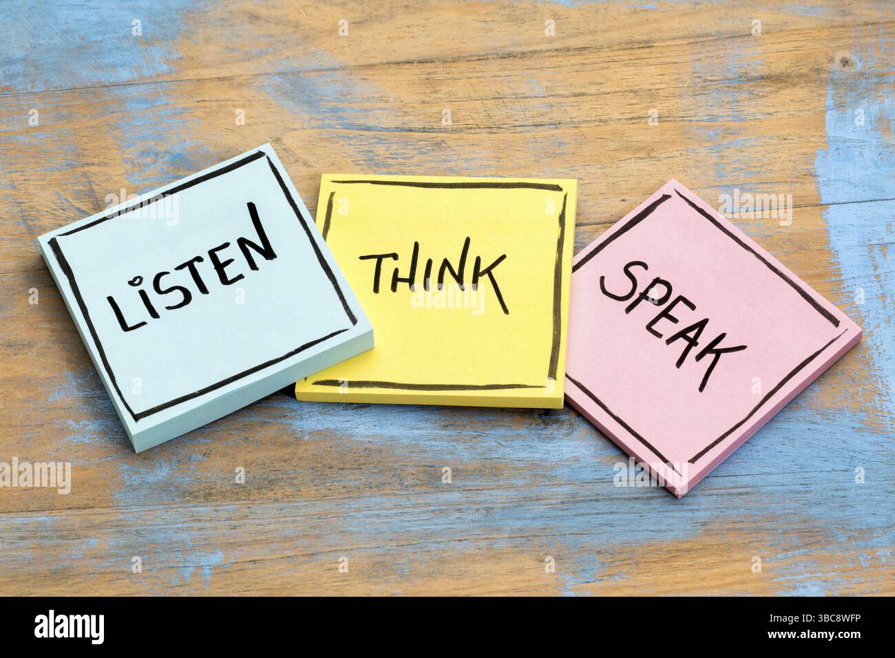 Listen, think, speak - communication concept - handwriting in black ink ...