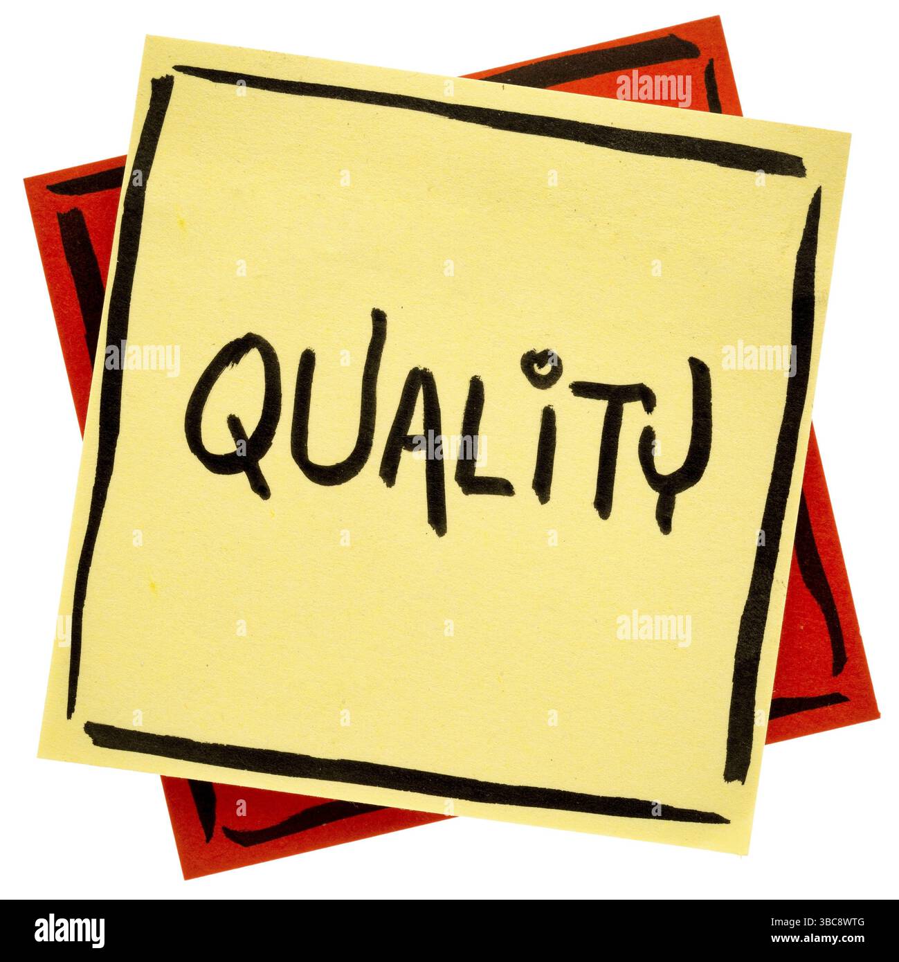 Quality reminder - handwriting in black ink on an isolated sticky note ...