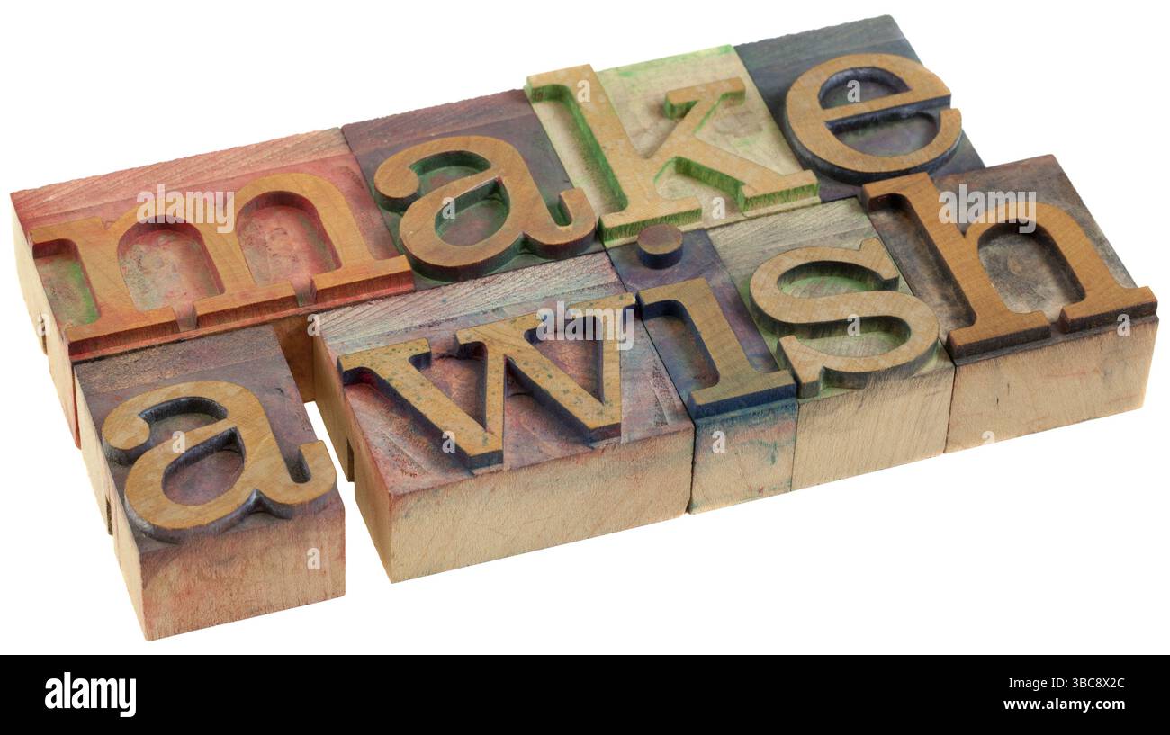 Make a wish - phrase in vintage wooden letterpress printing blocks ...