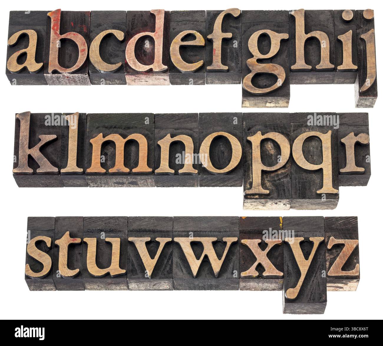 Wood type alphabet in letterpress printing blocks stained by color inks ...