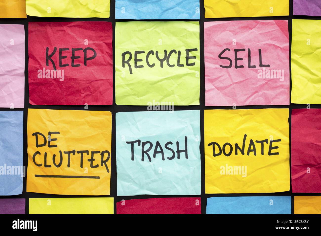 Declutter concept (keep, recycle, trash, sell, donate - handwriting on ...