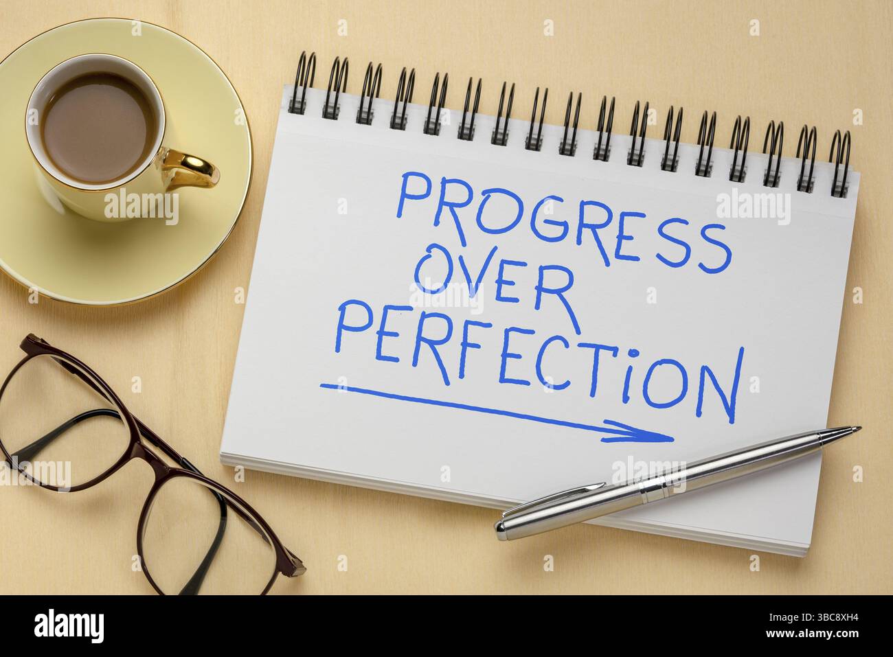 Progress over perfection inspirational handwriting in a sketchbook with ...