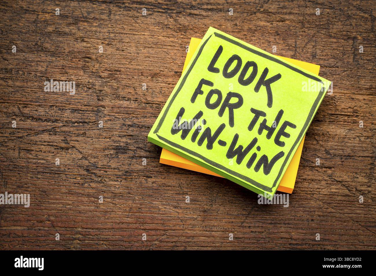 Look for win-win concept - handwriting on a sticky note against grunge ...
