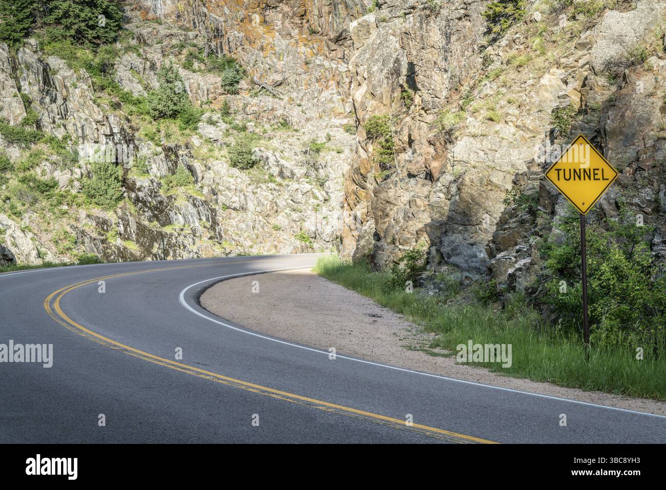 Colorado highway 14 approaching a tunnel in the Poudre Canyon near Fort ...
