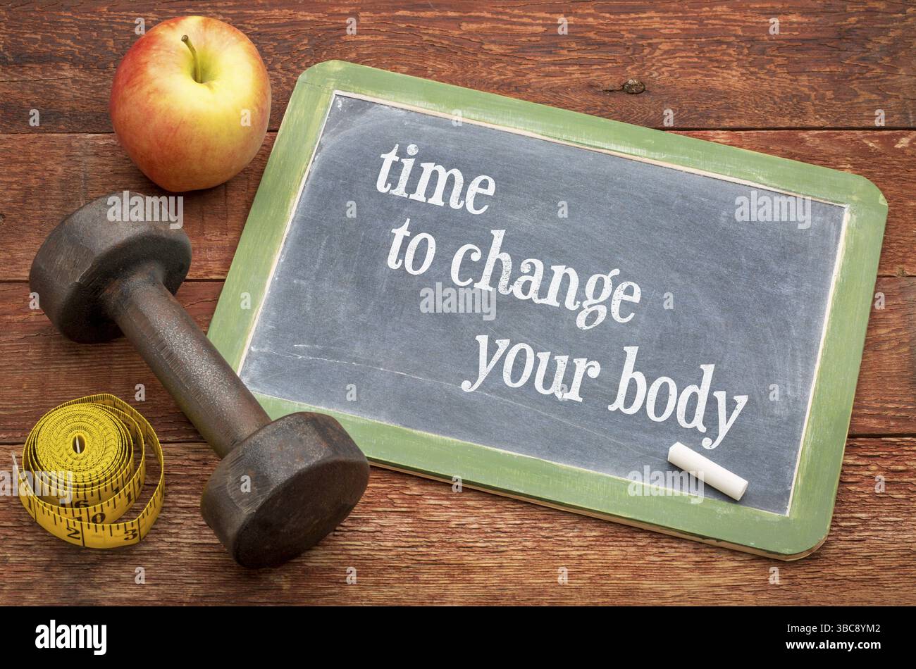 Time to change your body - slate blackboard sign against rustic wood ...