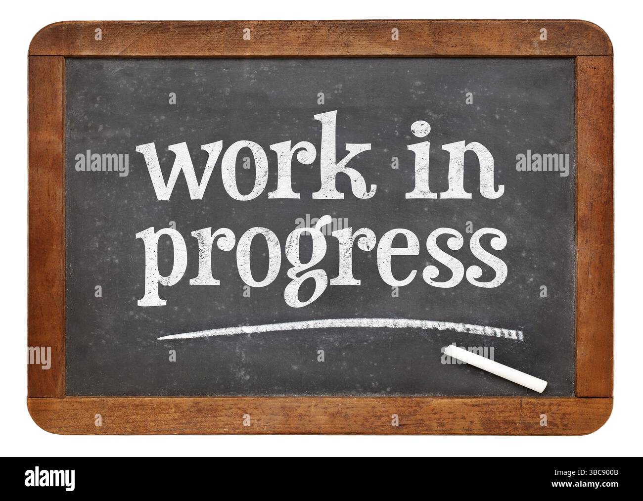 Work in progress - white chalk text on a vintage slate blackboard Stock ...