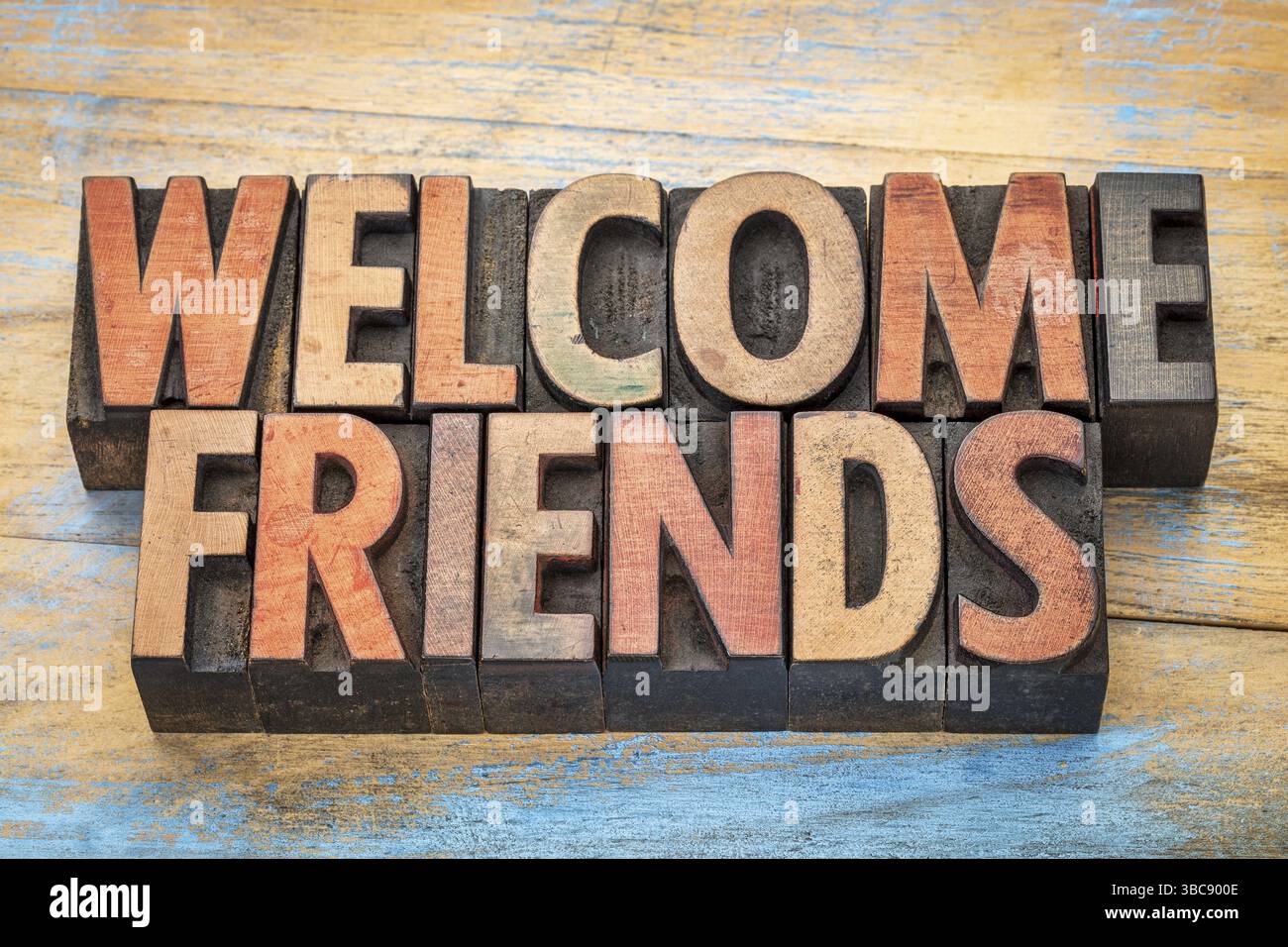 Welcome friends banner - text in vintage letterpress wood type blocks ...
