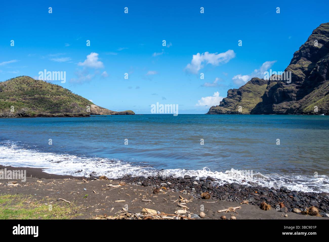 Towering green cliffs dominate Hakaui Bay, Nuku Hiva, Marquesas Islands ...