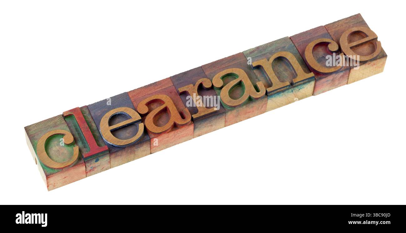 The clearance word in vintage wooden letterpress type blocks, stained ...