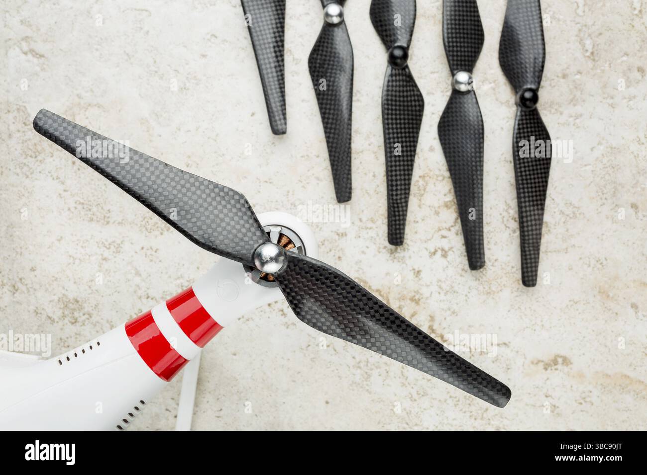 Carbon fiber propellers with a quadcopter drone arm Stock Photo - Alamy