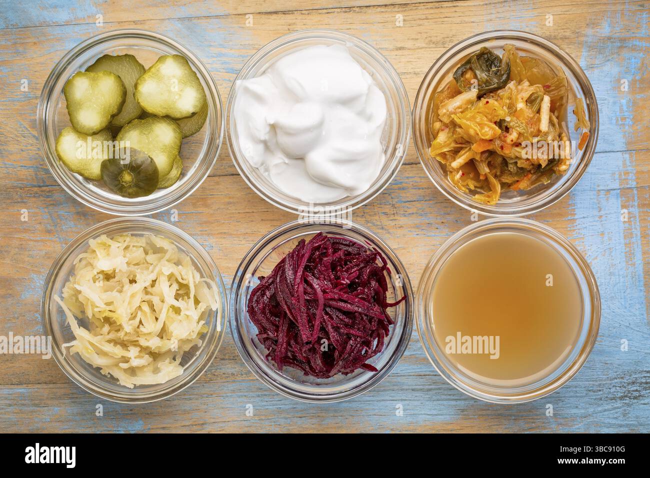 A set of fermented food great for gut health - top view of glass bowls ...