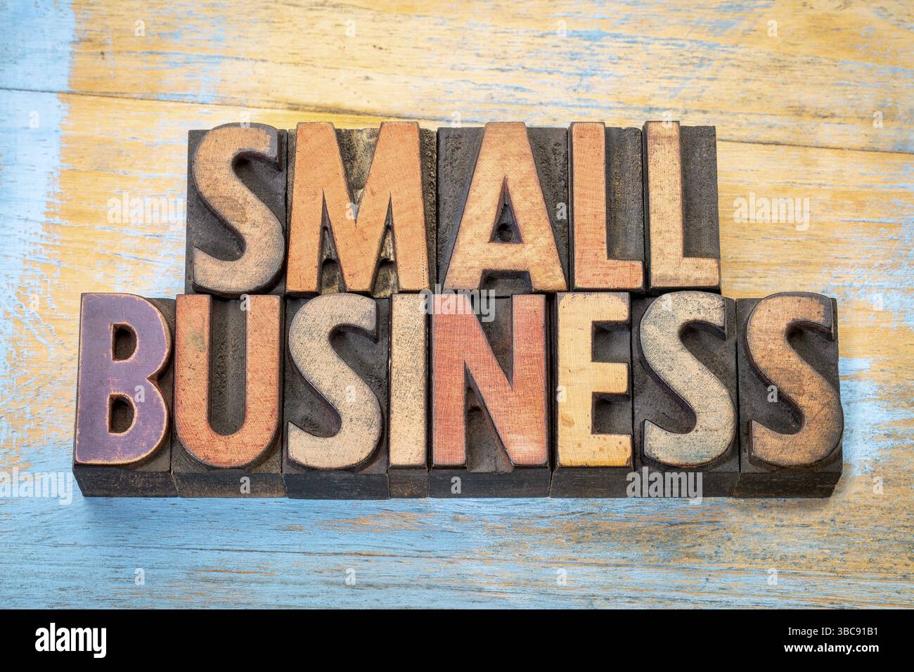 Small business banner in vintage letterpress wood type blocks stained ...